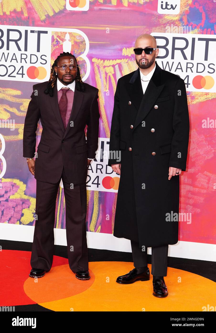 Asake (left) attending the Brit Awards 2024 at the O2 Arena, London ...
