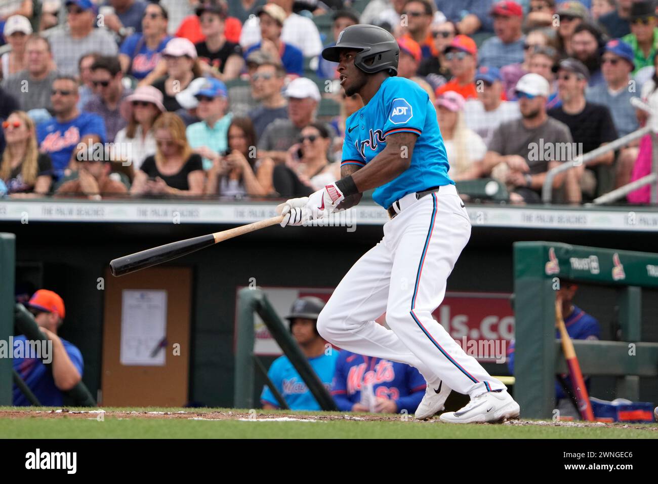 Miami Marlins' Tim Anderson follows through on a single during the ...