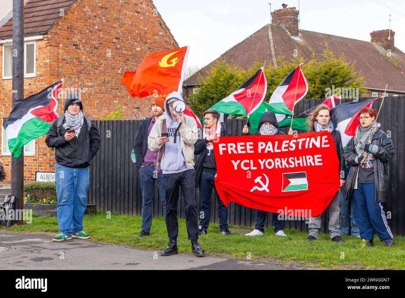 Brough, UK. 02 MAR, 2024. Gathered Pro Palestine protestors wave ...
