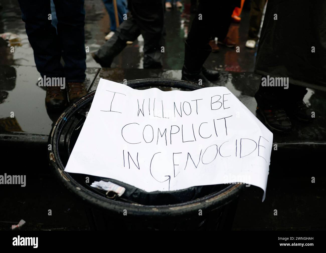 New York, United States. 02nd Mar, 2024. Protesters hold signs and ...