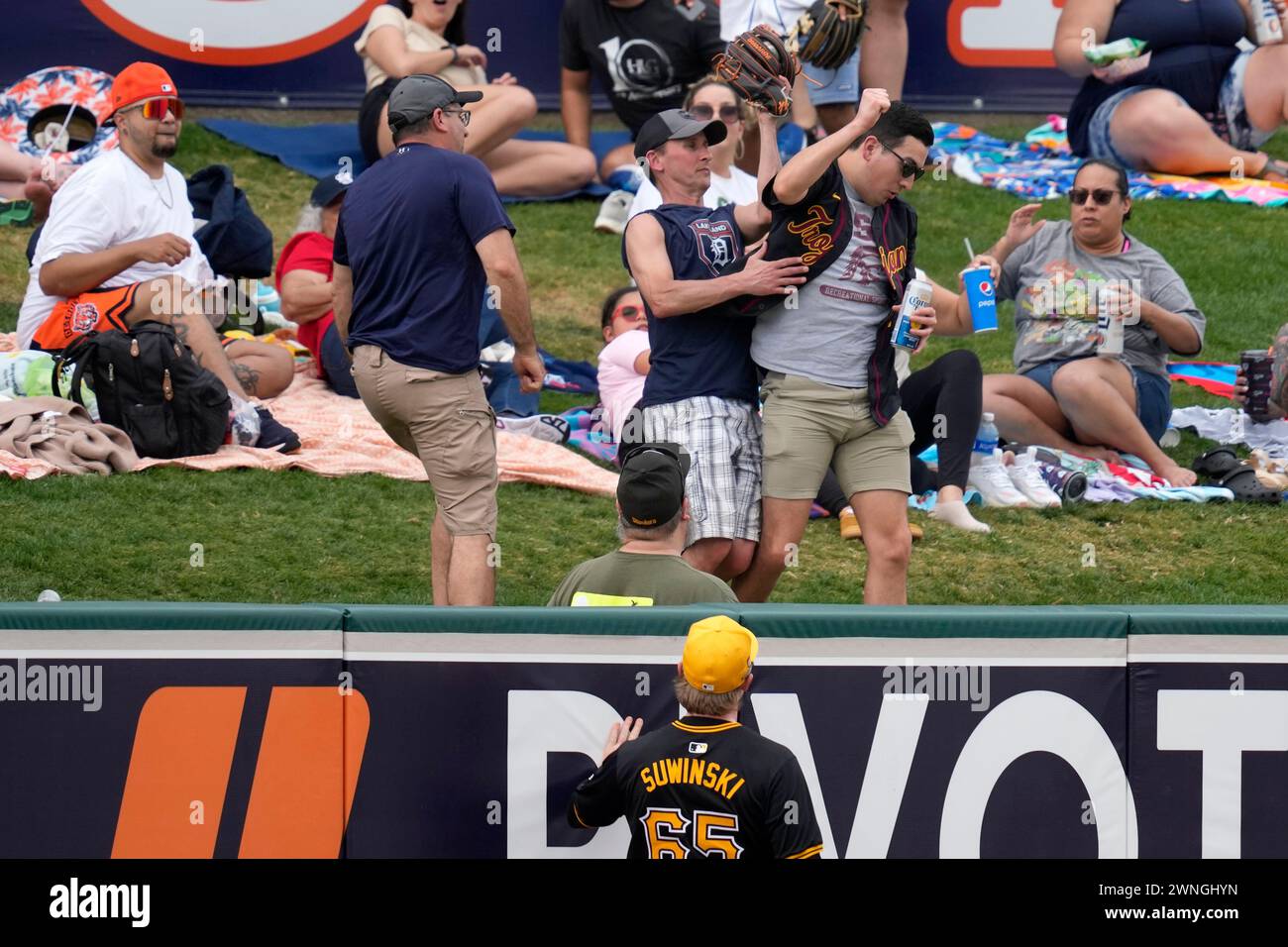 Fans catch a home run by Detroit Tigers' Andy Ibanez over Pittsburgh ...