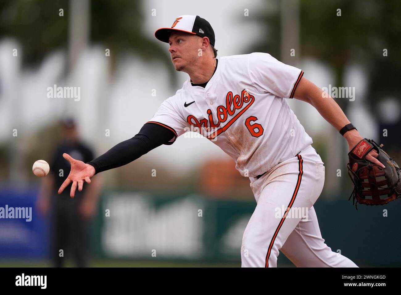 Baltimore Orioles first baseman Ryan Mountcastle (6) tosses to pitcher Dillon Tate covering ...