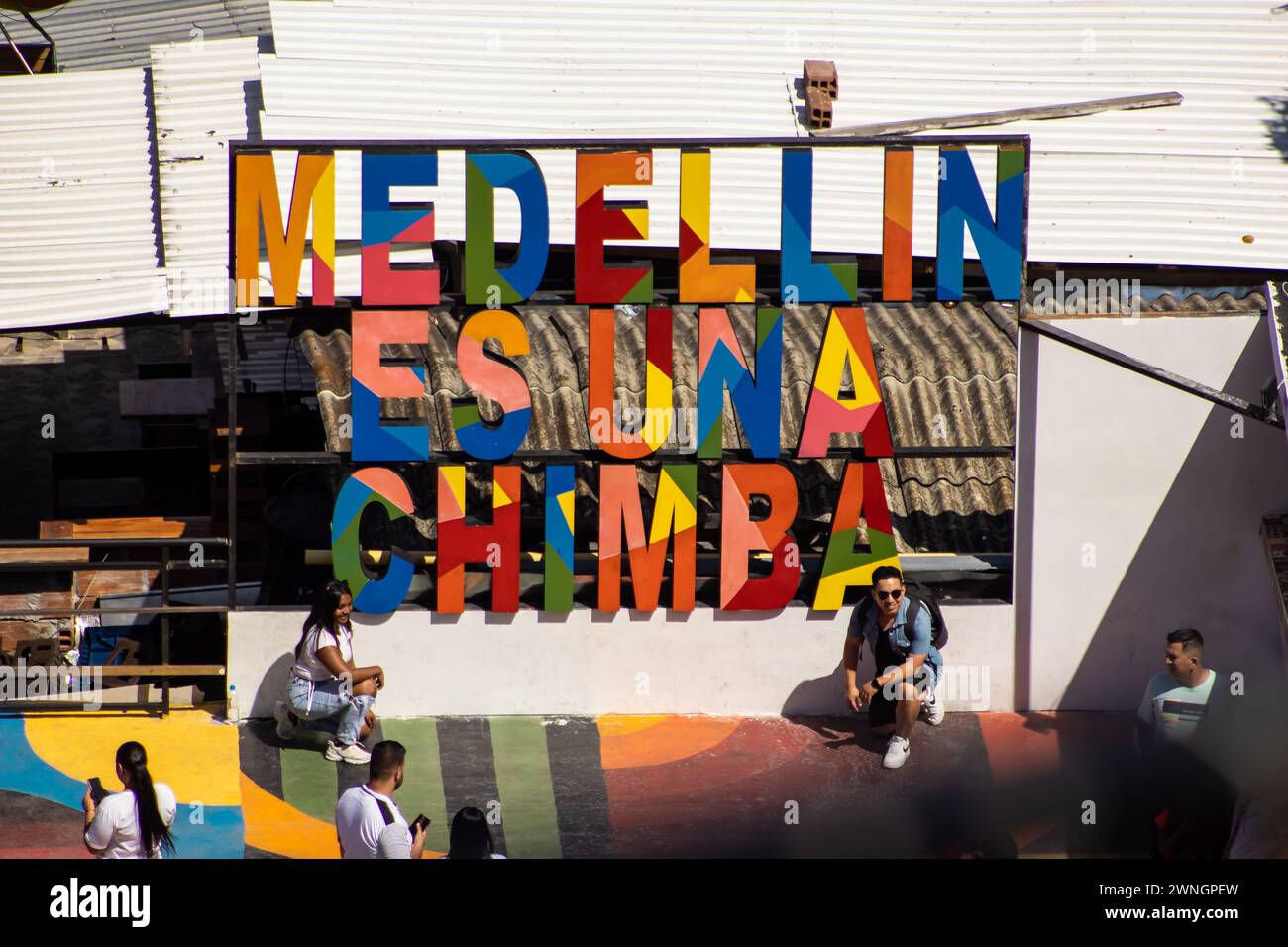 MEDELLIN, COLOMBIA - JANUARY 17, 2024: Colourful terrace with the sign ...
