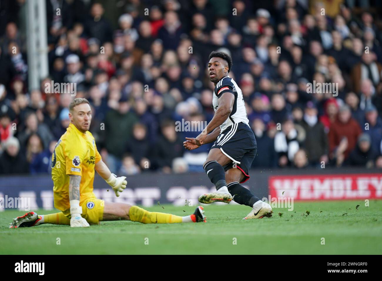 LONDON, ENGLAND - MARCH 02: Adama Traoré of Fulham putting the ball ...