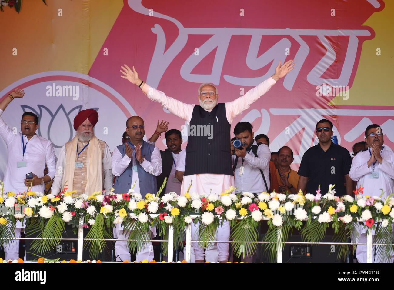 Prime Minister Narendra Modi waves to supporters during a Public ...