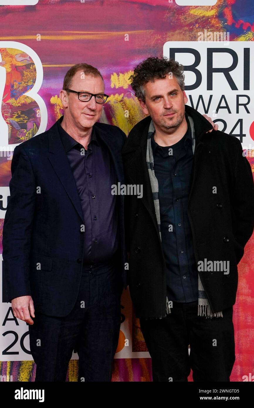 Dave Rowntree, left, and James Ford pose for photographers upon arrival ...
