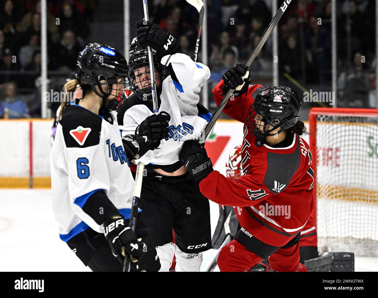Toronto's Victoria Bach (51) and Ottawa's Akane Shiga (11) clash after ...
