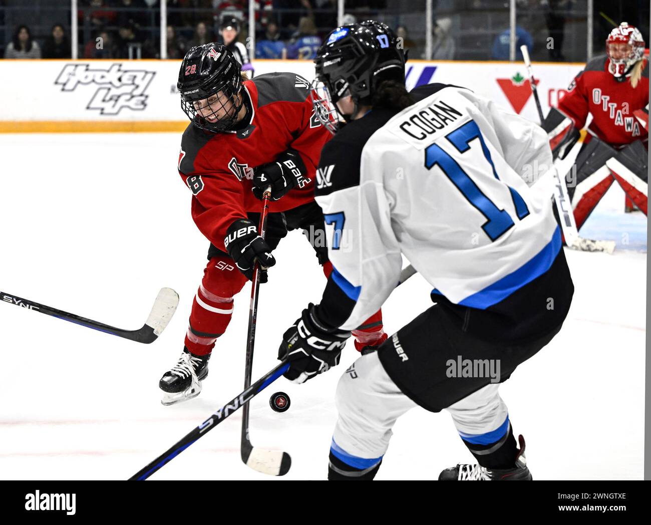 Ottawa's Amanda Boulier (28) controls the puck in front of Toronto's ...