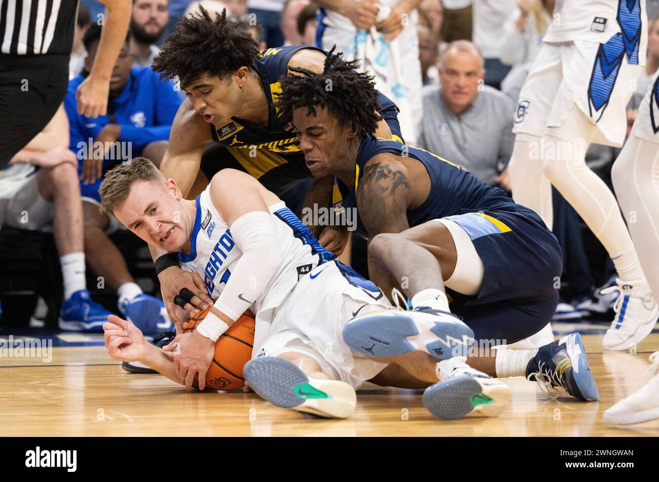 Creighton's Steven Ashworth, from left, scrambles for a loose ball ...