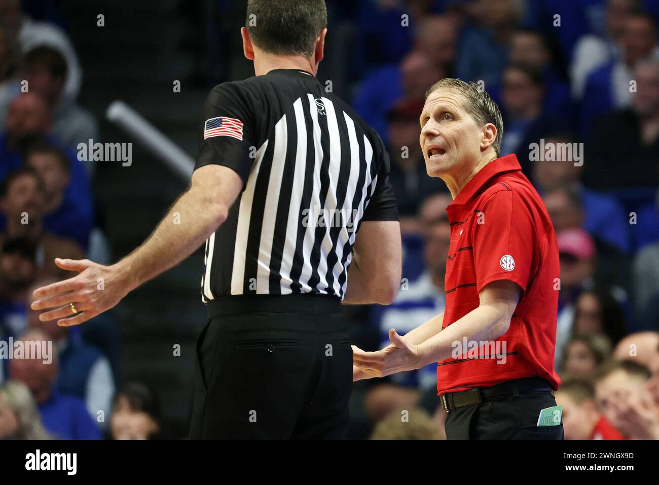 Arkansas head coach Eric Musselman, right, pleads his case with referee ...