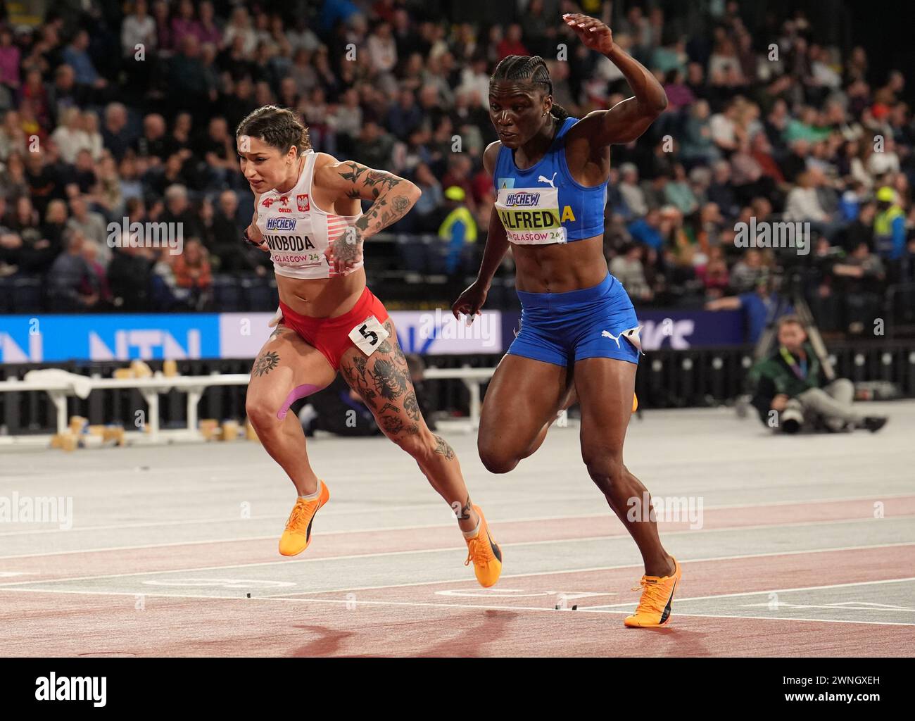 Saint Lucia's Julien Alfred (right) wins the Women's 60m final during day two of the World ...