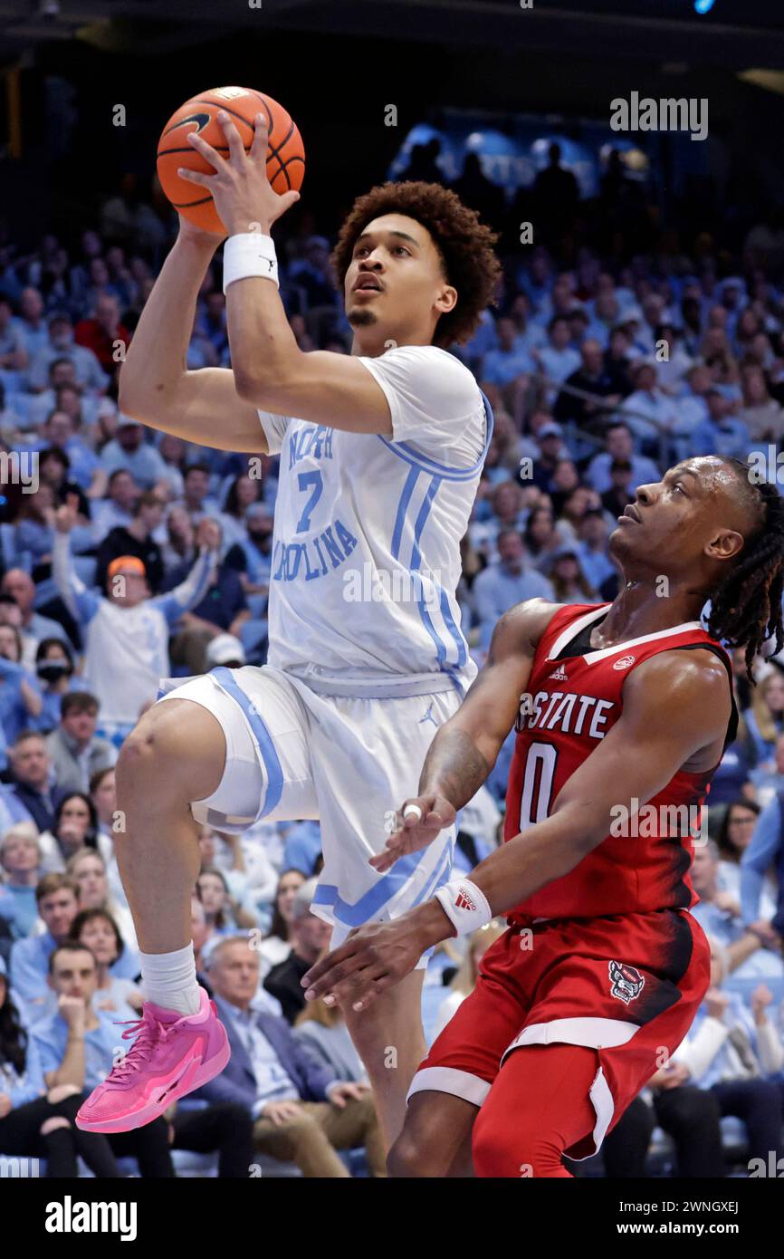 North Carolina guard Seth Trimble (7) weaves past North Carolina State ...