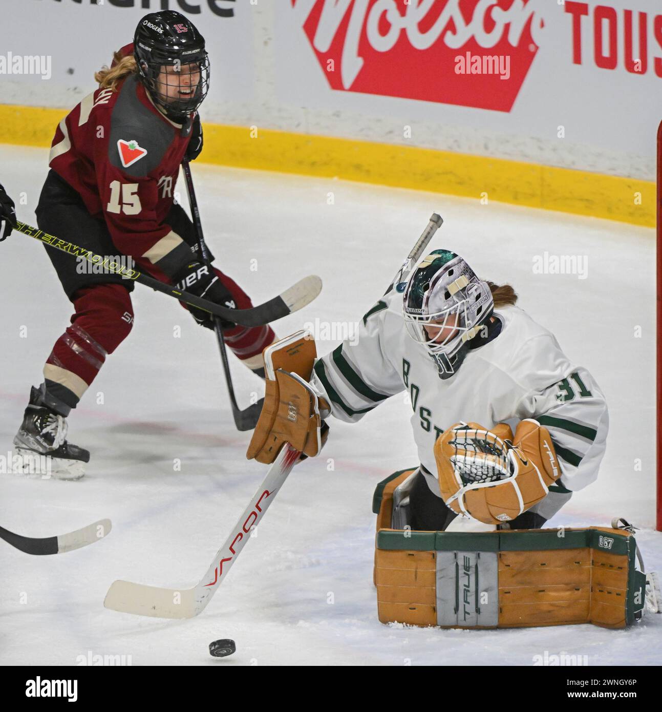 Montreal's Maureen Murphy (15) moves in against Boston goaltender Aerin ...