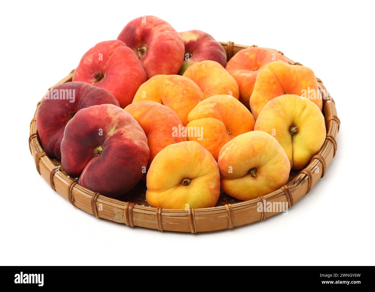 chinese flat peaches on white background Stock Photo - Alamy