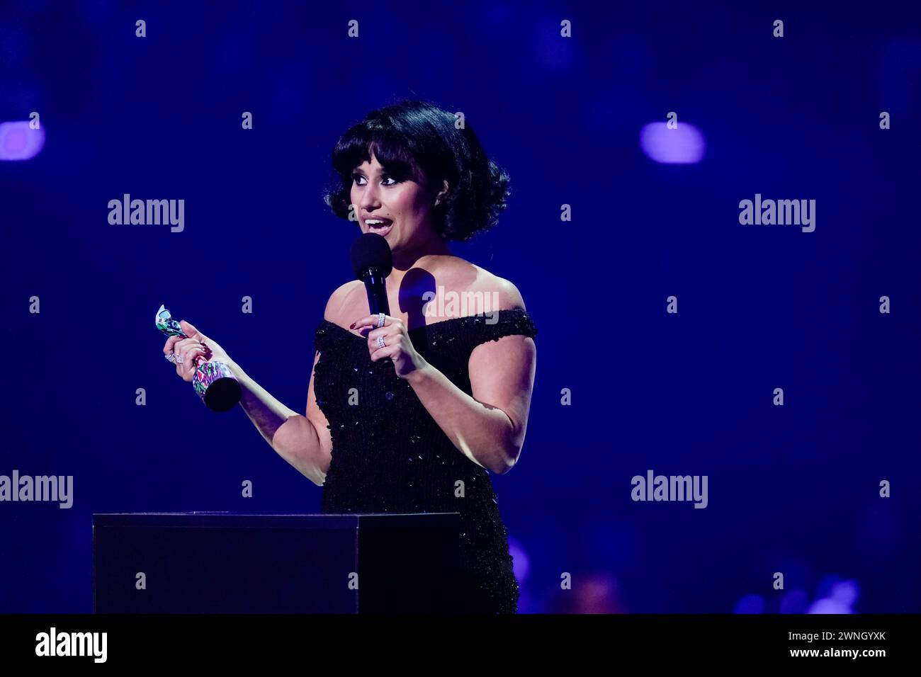 Raye holds the award for song of the year for 'Escapism' during the ...