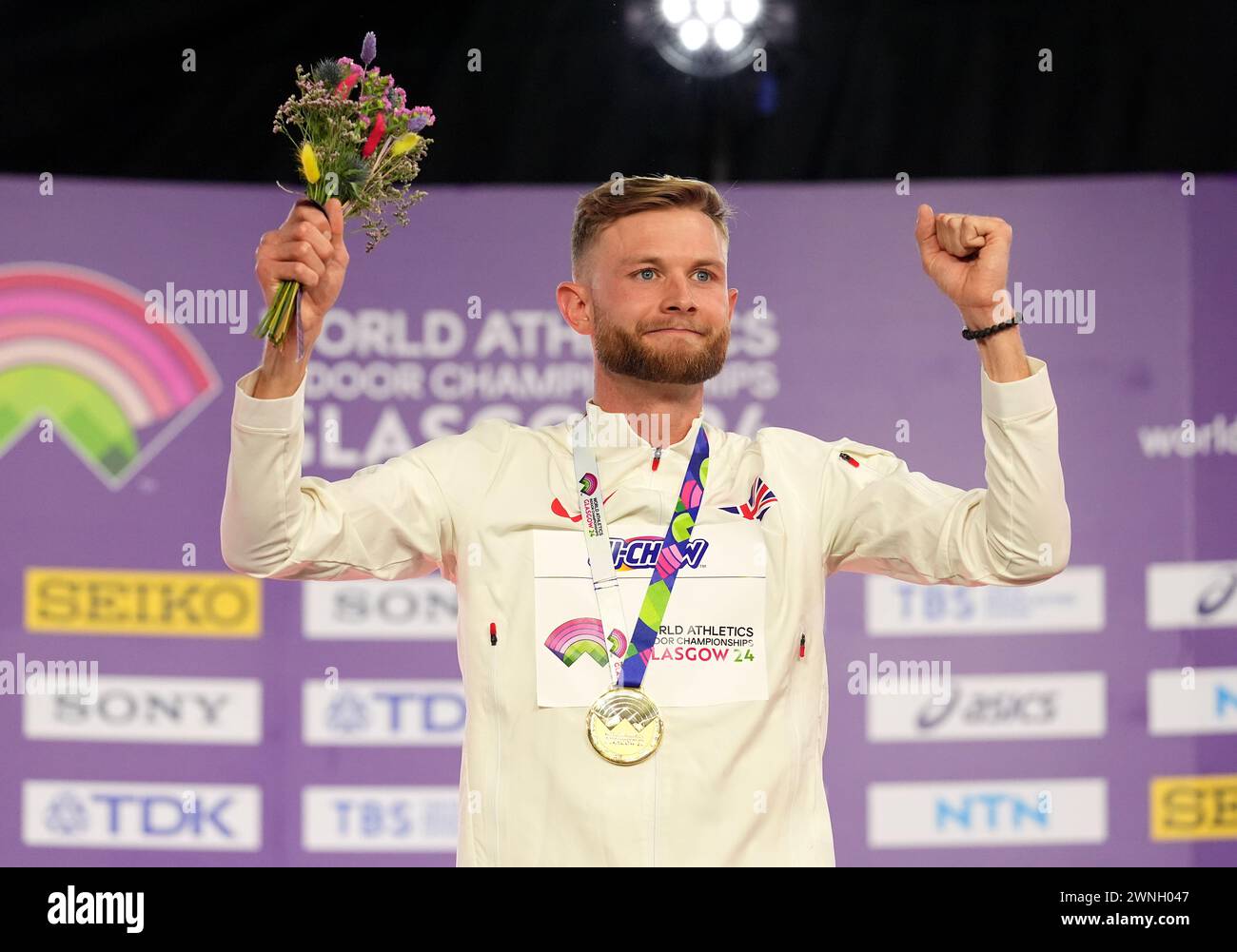 Great Britain's Josh Kerr celebrates gold on the podium for the Men's ...