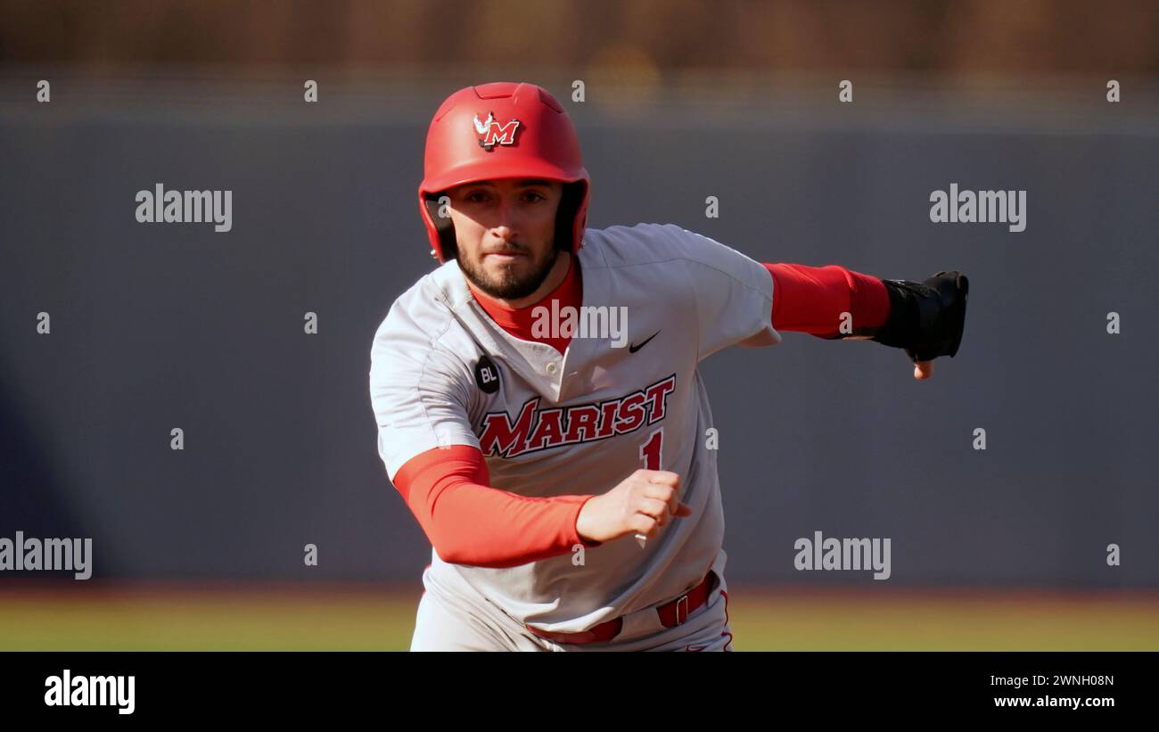 Marist infielder Marco Ali (1) sprints home during an NCAA baseball ...