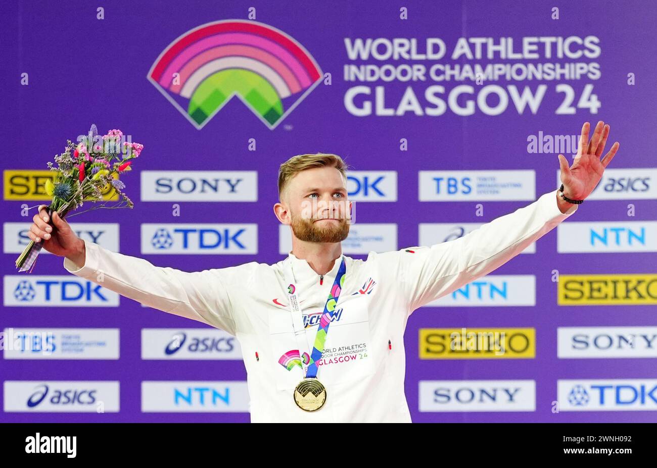 Great Britain's Josh Kerr celebrates gold on the podium for the Men's ...