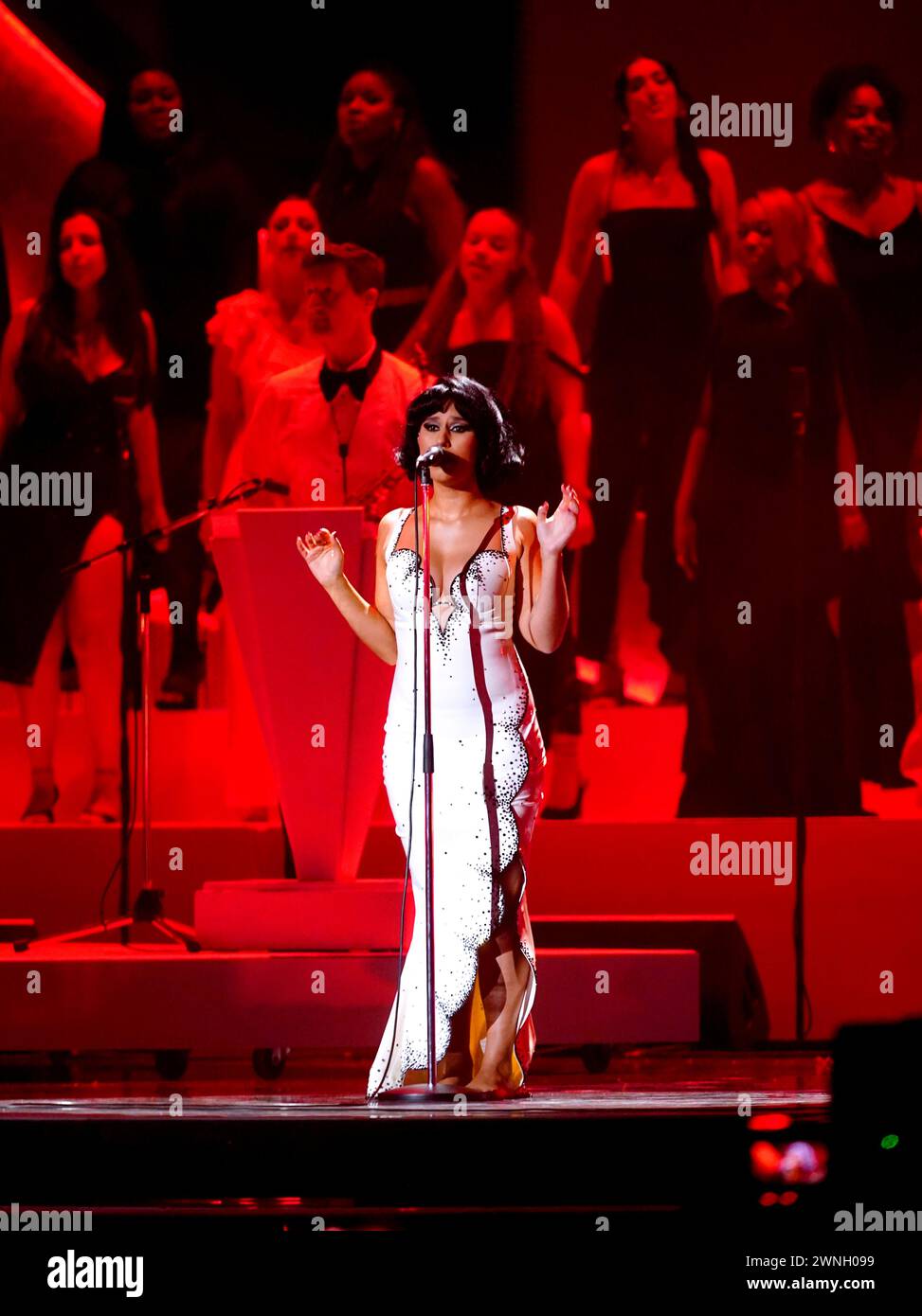 Raye performing on stage during the Brit Awards 2024 at the O2 Arena ...