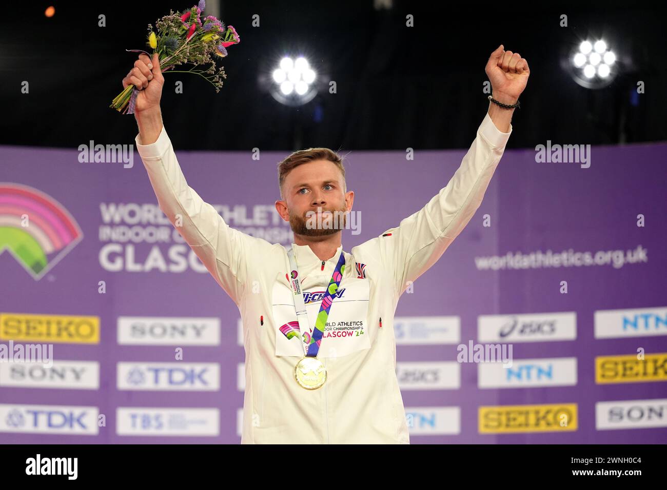 Great Britain's Josh Kerr celebrates gold on the podium for the Men's ...