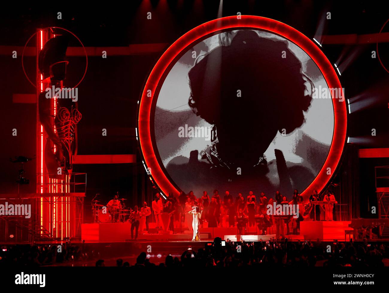 Raye performing on stage during the Brit Awards 2024 at the O2 Arena ...