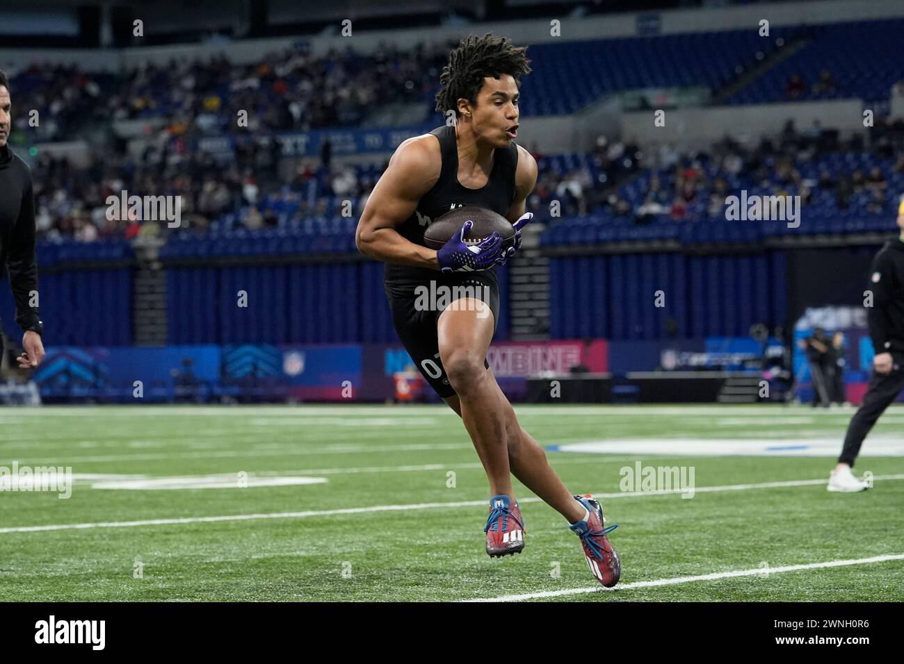 Holy Cross wide receiver Jalen Coker runs a drill at the NFL football ...
