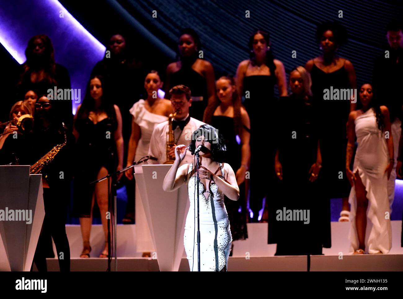 Raye performing on stage during the Brit Awards 2024 at the O2 Arena ...