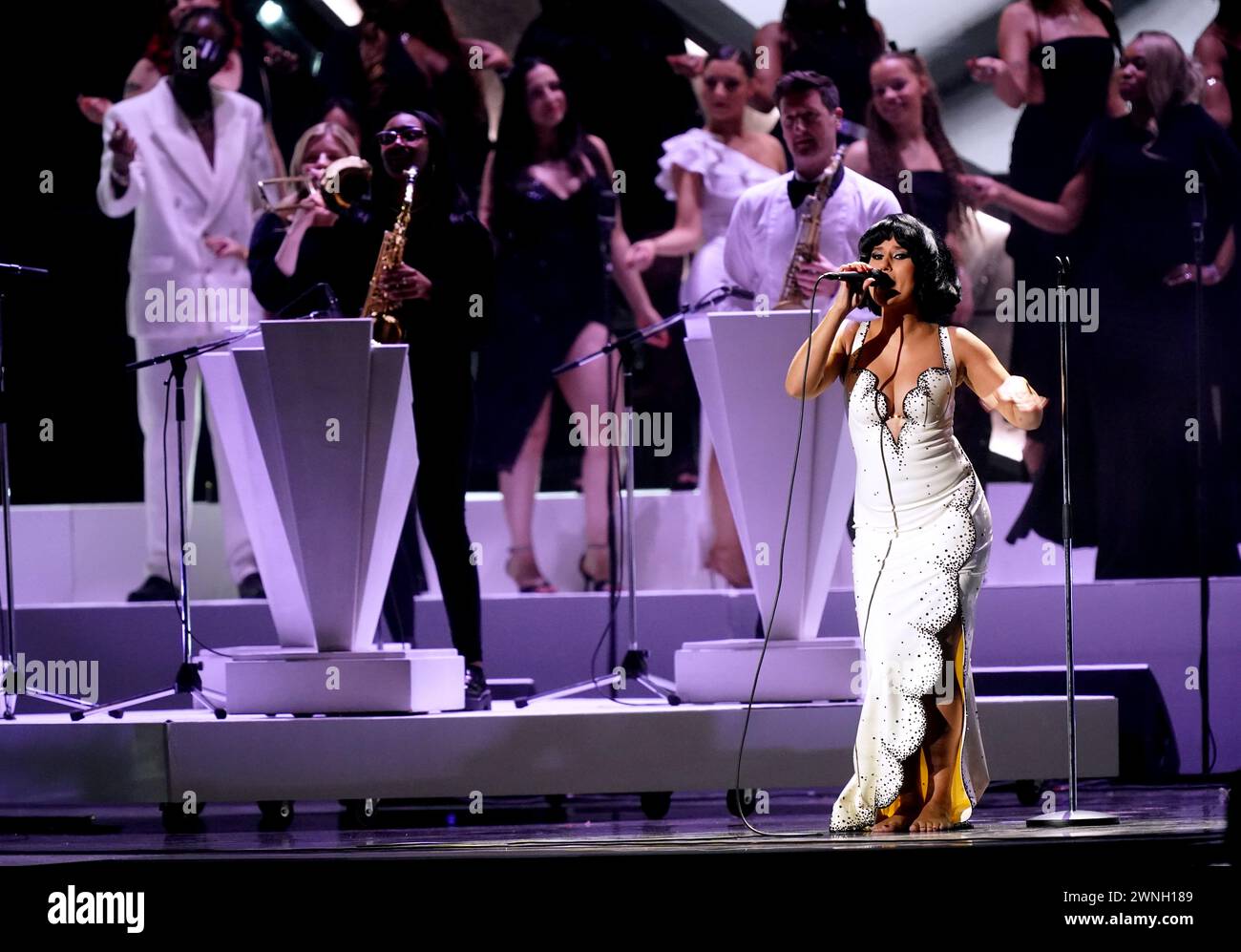 Raye performing on stage during the Brit Awards 2024 at the O2 Arena ...