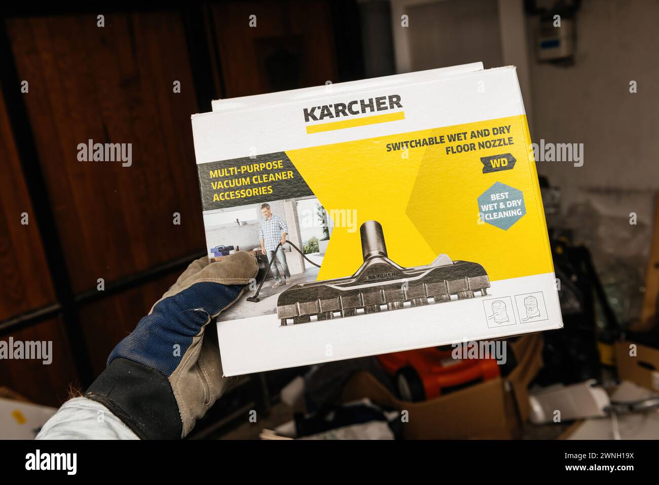 Bremen, Germany Dec 10, 2023: A male hand holds the Karcher multi ...