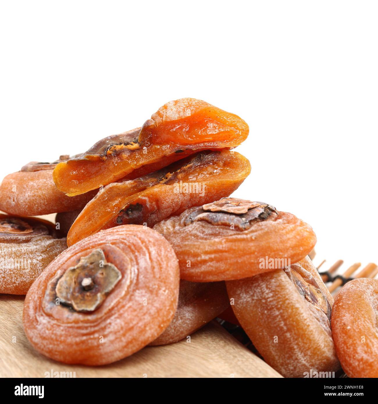dried persimmon on white background Stock Photo - Alamy