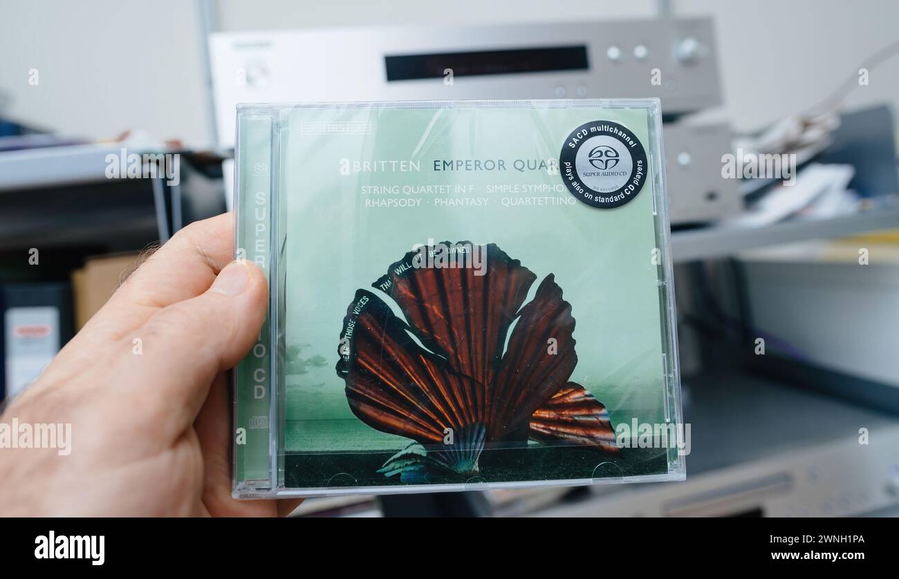 Paris, France - Dec 28, 2023: A male hand holds the new SACD Super ...