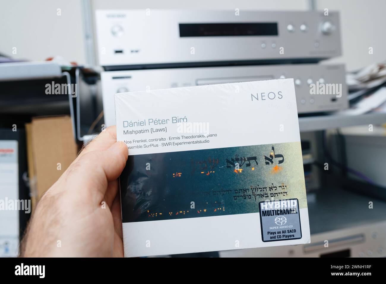 Paris, France - Dec 28, 2023: POV shot captures a male hand holding the ...