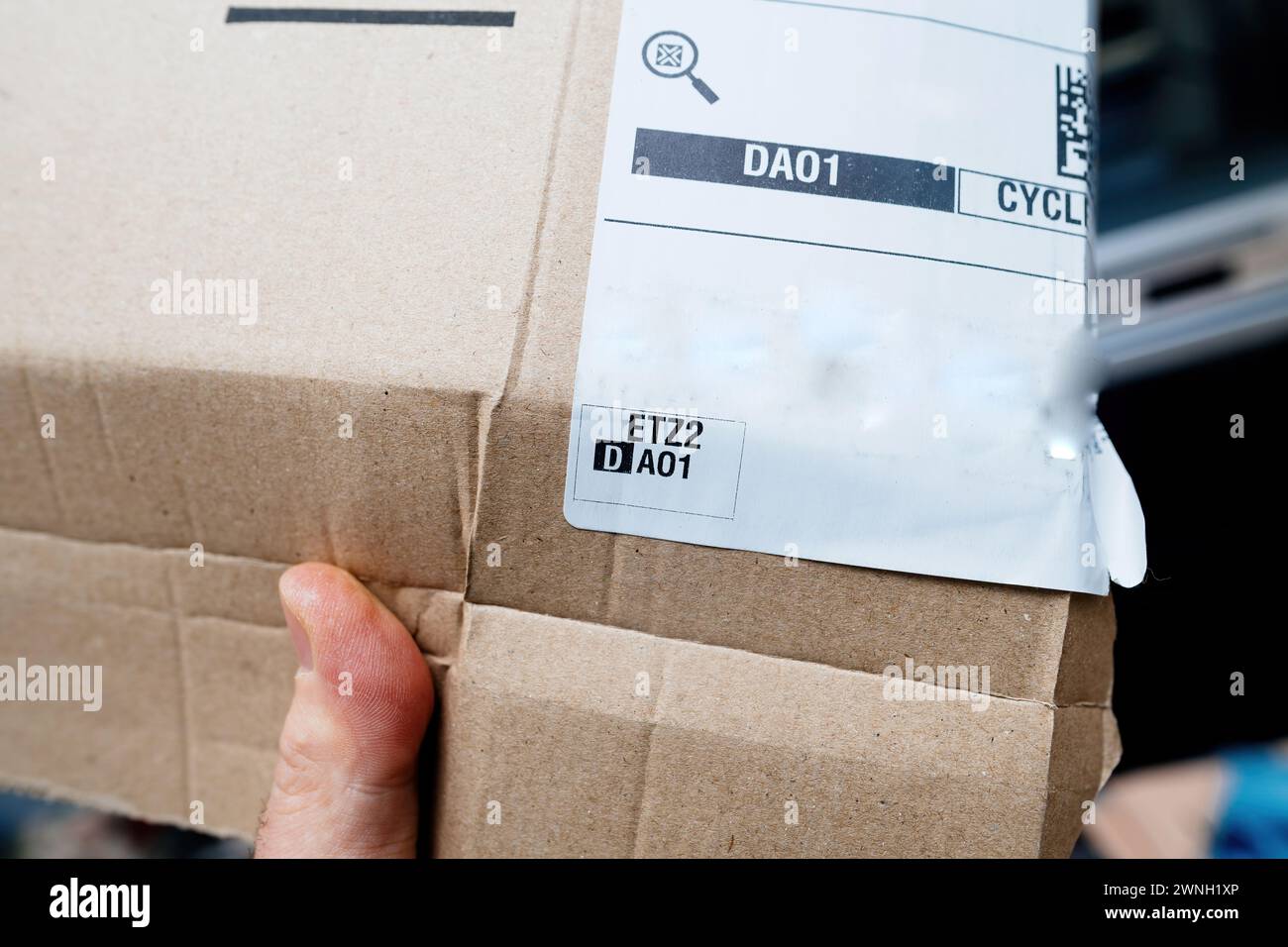 Paris, France - Dec 28, 2023: From a POV perspective, a male hand holds ...
