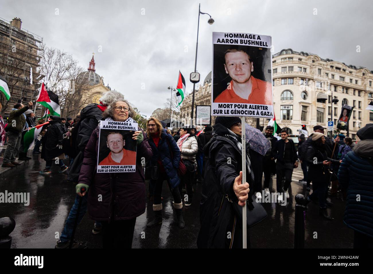 Protestors hold photos of Aaron Bushnell, during his tribute at St ...