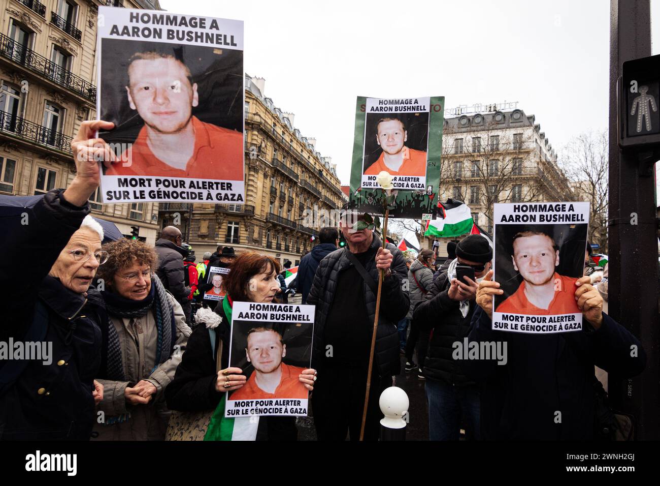 Protestors hold photos of Aaron Bushnell, during his tribute at St ...