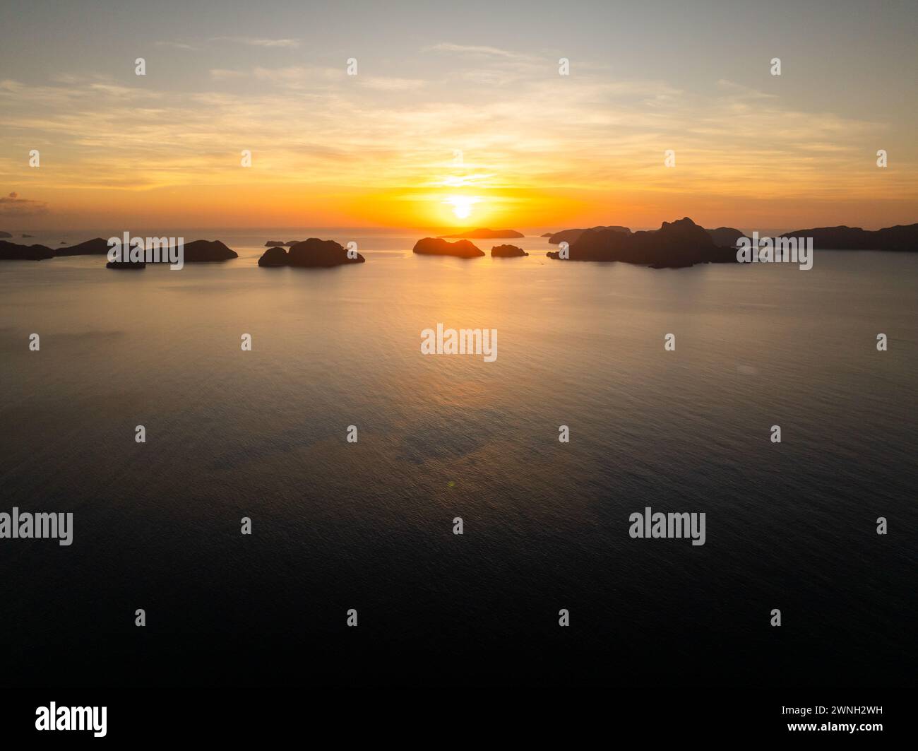Orange sky over the Islands. Sunset view in El Nido. Palawan ...