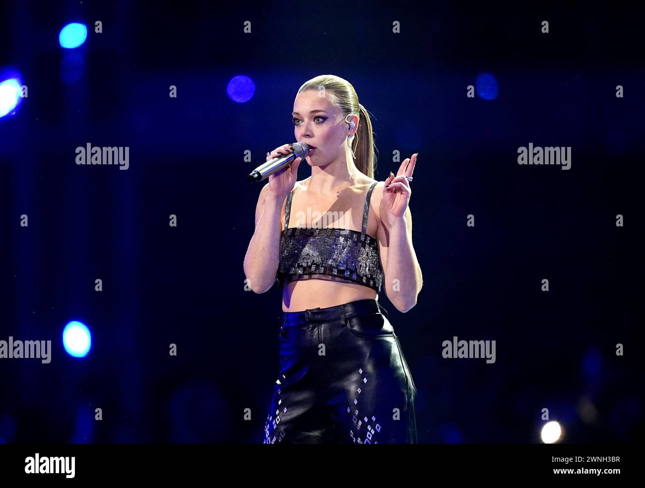 Becky Hill performing on stage during the Brit Awards 2024 at the O2 ...
