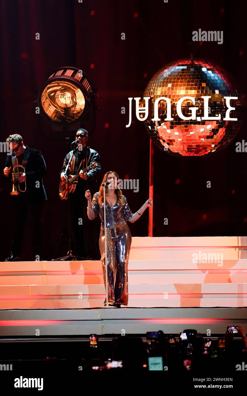 Lydia Kitto, centre front, of Jungle performs during the Brit Awards ...