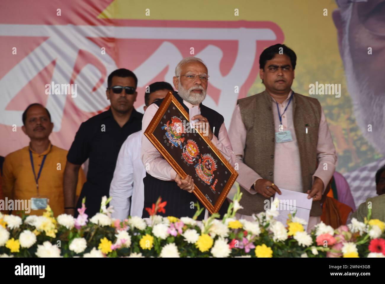 Prime Minister Narendra Modi waves to supporters during a Public ...