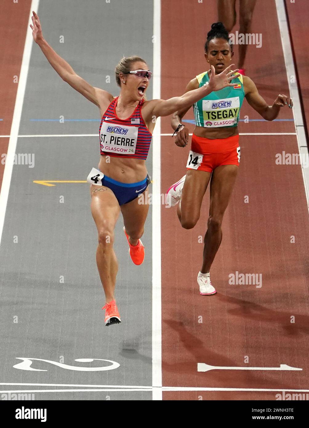 USA's Elle St. Pierre (left) crosses the finish line to win the Women's ...