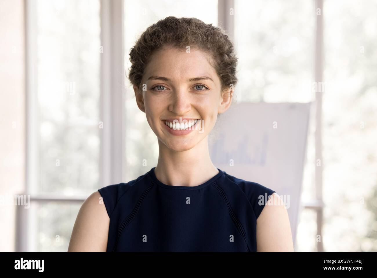 Ambitious woman office employee, staff member posing at workplace Stock Photo - Alamy