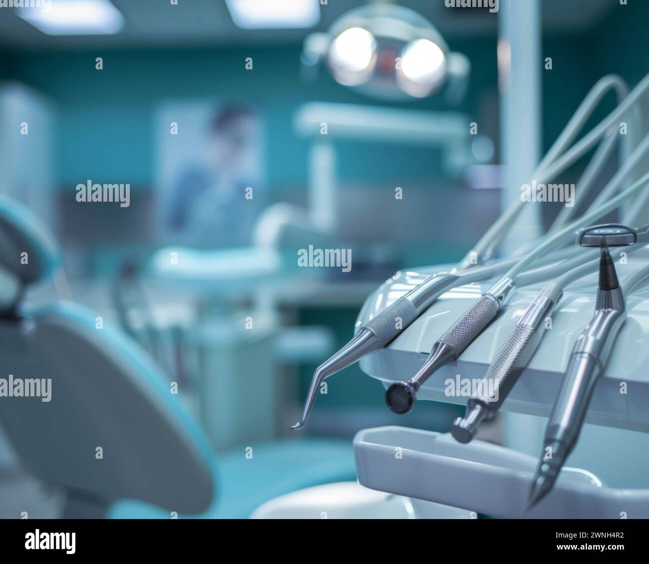 A modern dentist chair equipped with various dental tools for ...