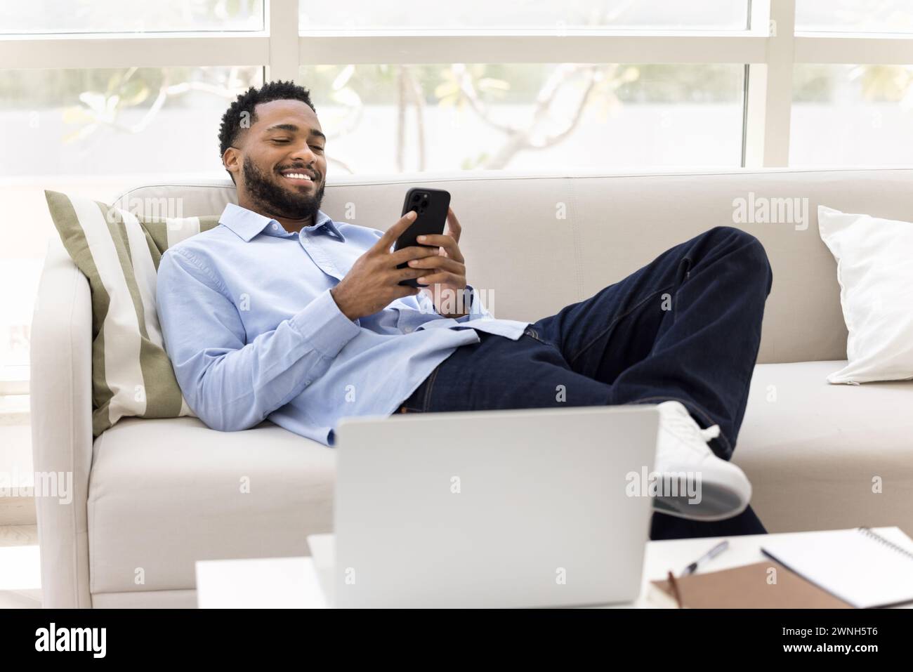 African male freelancer using hi-res stock photography and images - Alamy