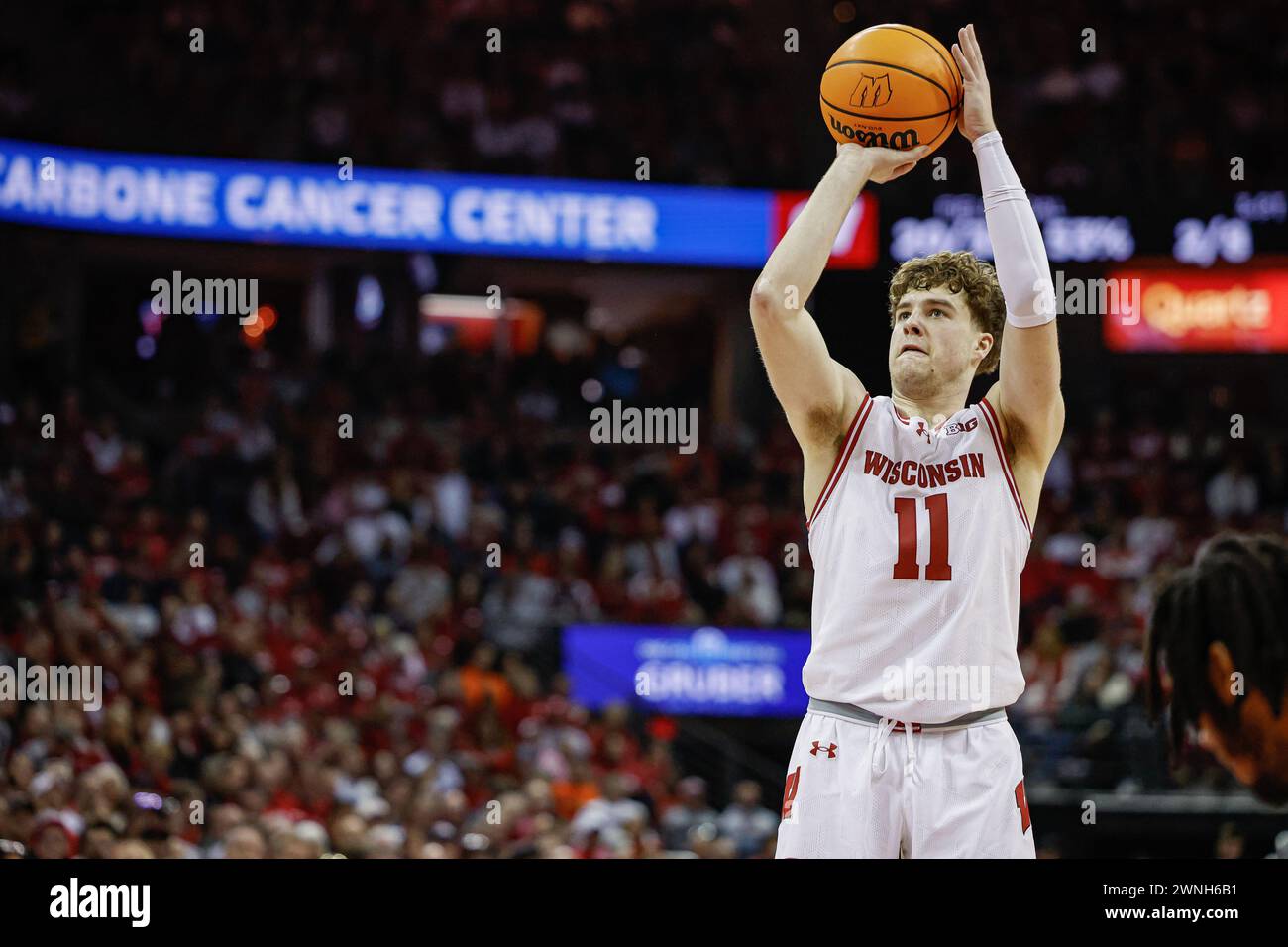 Madison, WI, USA. 2nd Mar, 2024. Wisconsin Badgers guard Max Klesmit ...