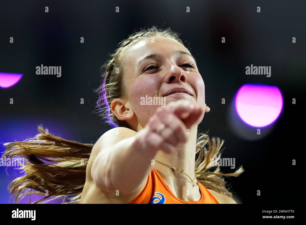 Femke Bol, of the Netherlands, crosses the finish line to win the gold ...
