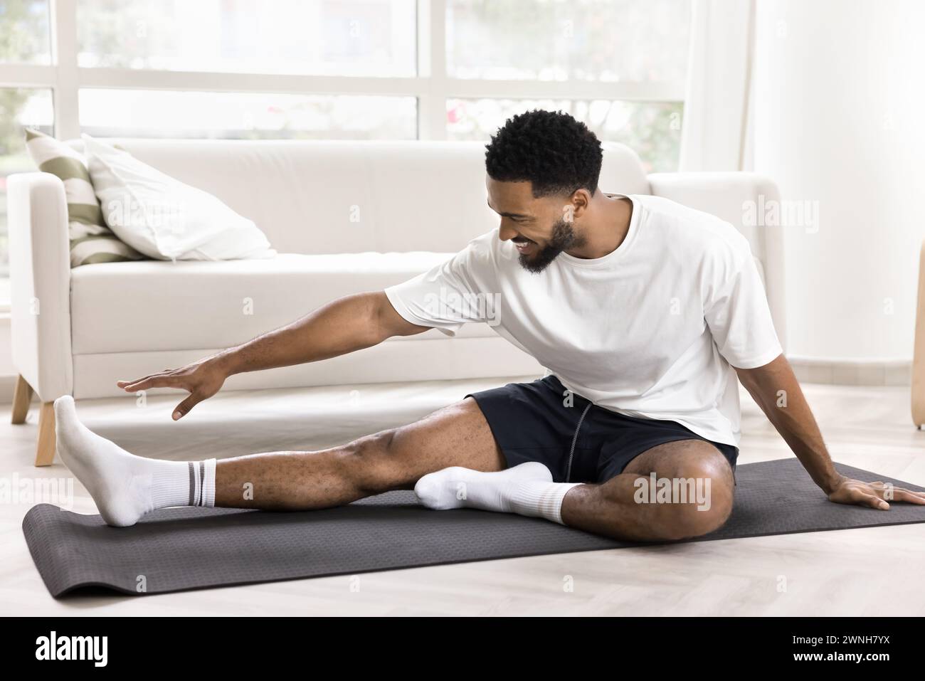 Happy active young Black man keeping fit, training body Stock Photo - Alamy