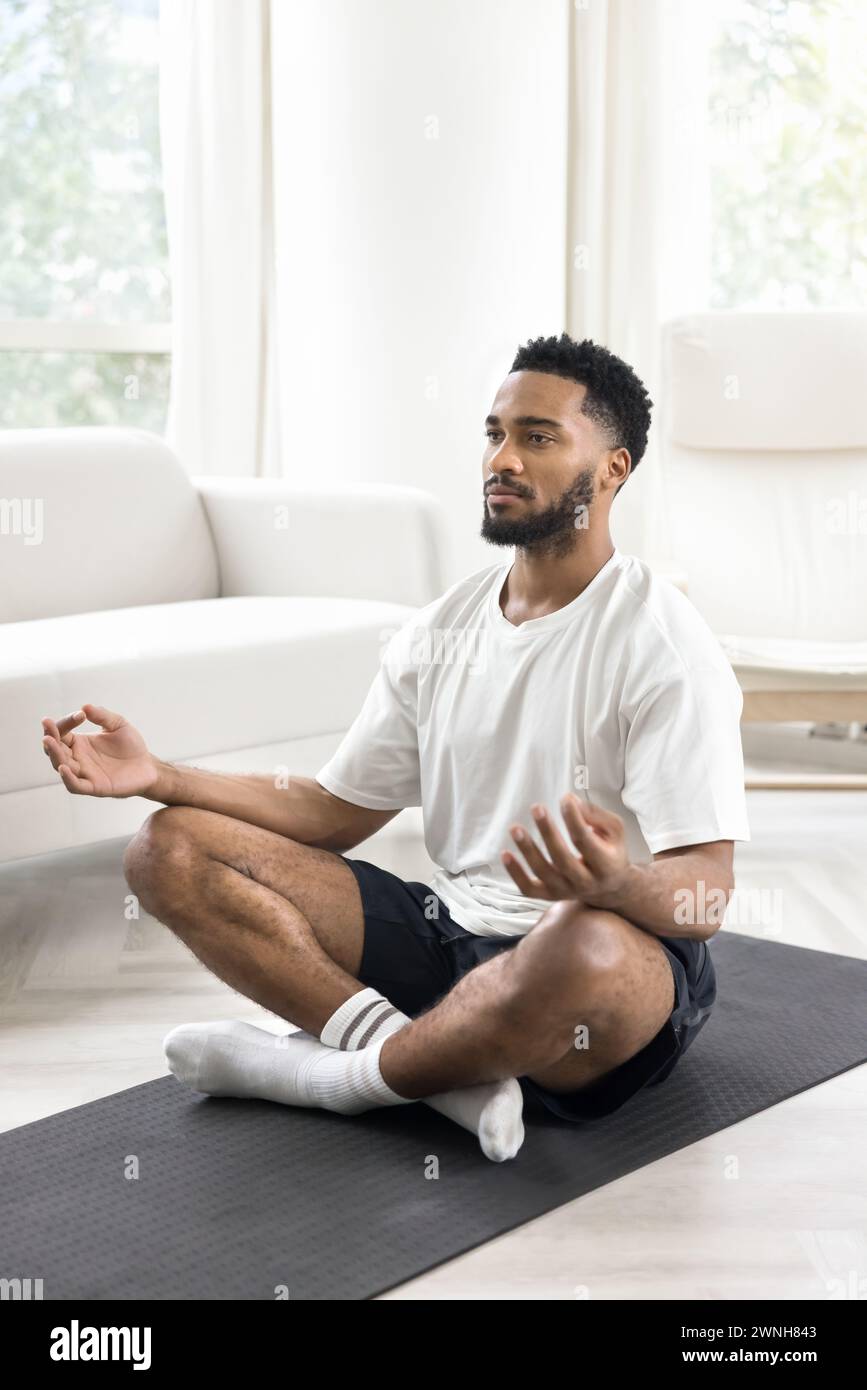African man meditating close hi-res stock photography and images - Alamy