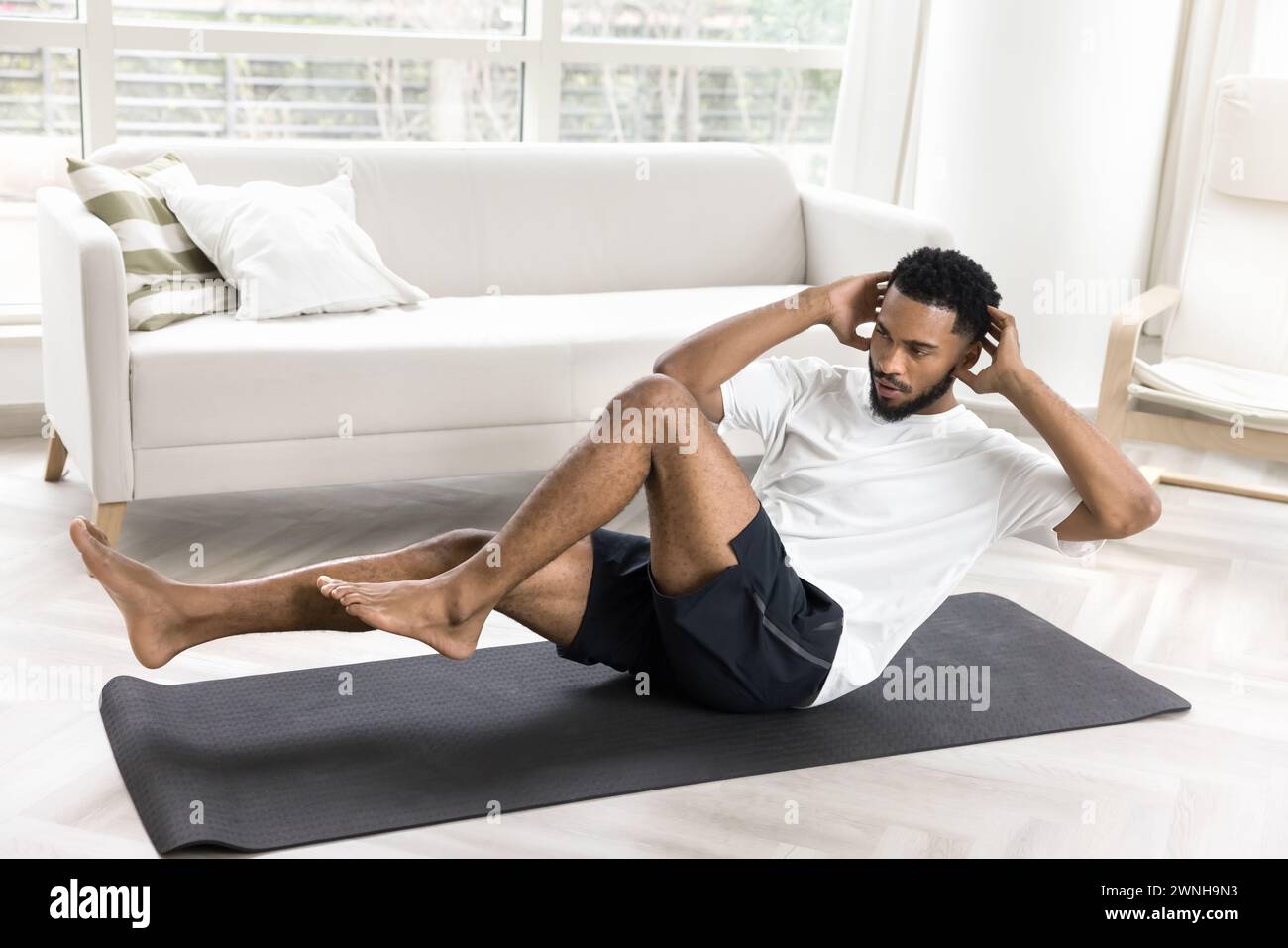 Navasana twisting hi-res stock photography and images - Alamy