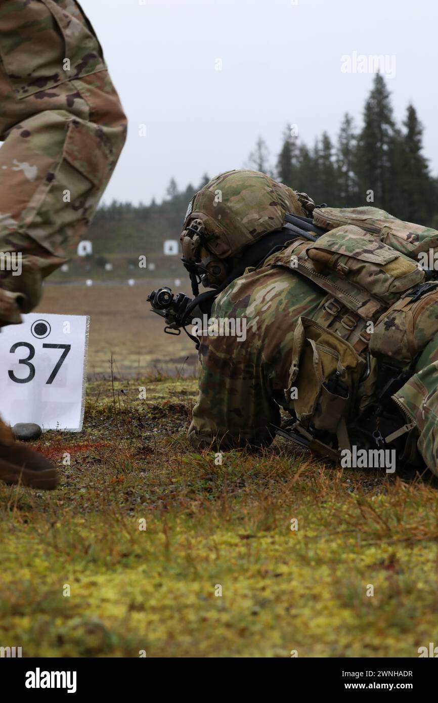 A U.S. Army Soldier prepares to clear his weapon after participating in ...