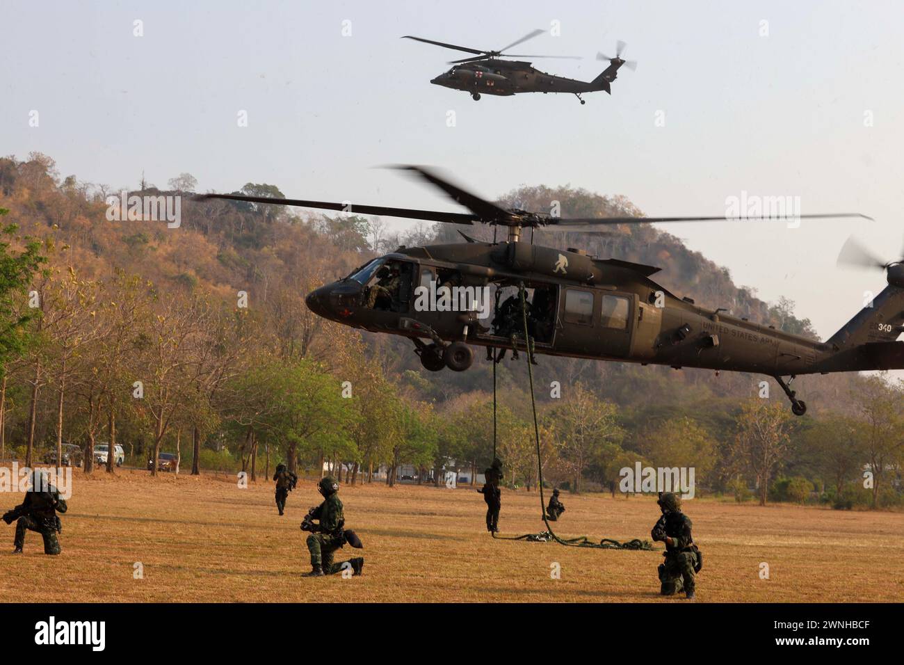 Royal Thai Army soldiers with the Royal Thai Army Special Warfare Command, rehearse movements ...